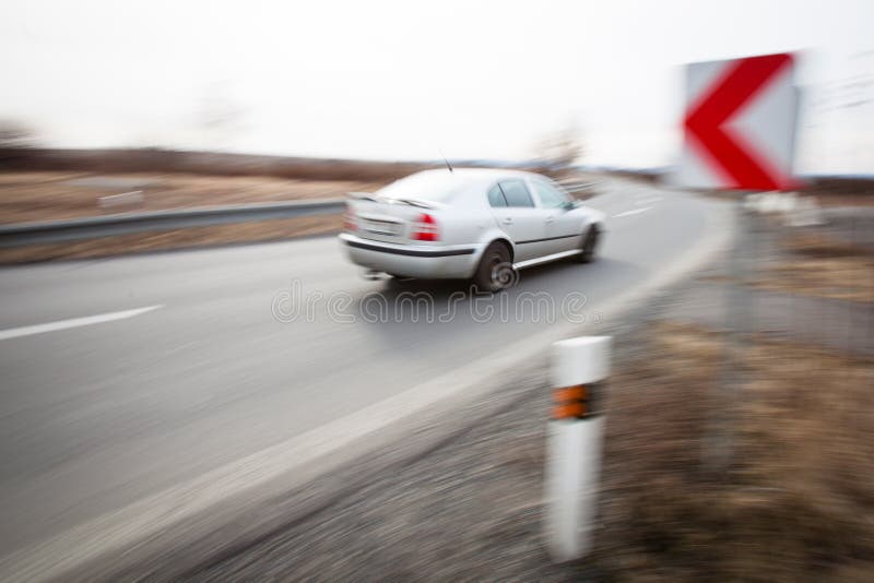 Car Driving Fast through a Sharp Turn Stock Image - Image of ...
