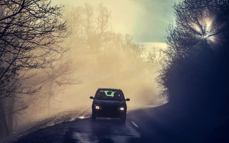 Car Driving on Foggy Forest Road Stock Image - Image of driving, curve ...