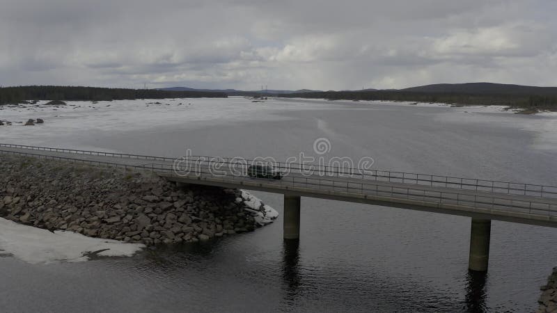 Car Driving on a Long Bridge in the Swedish Lapland Stock Footage ...