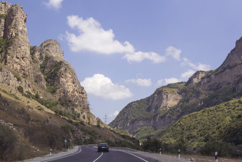 Car Driving through the Mountain Road Stock Photo - Image of colors ...