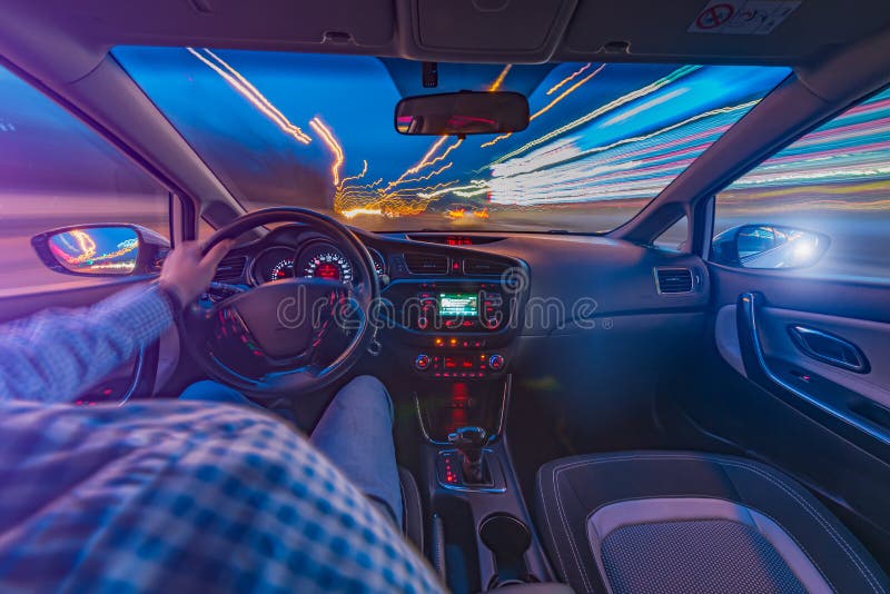 Car driving at night stock image. Image of movement - 142068385