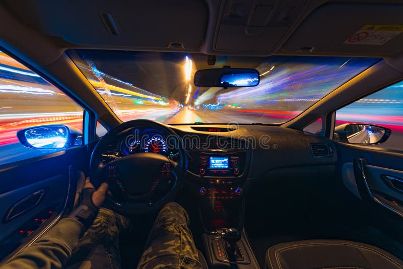 Car driving at night stock image. Image of blur, city - 141455387