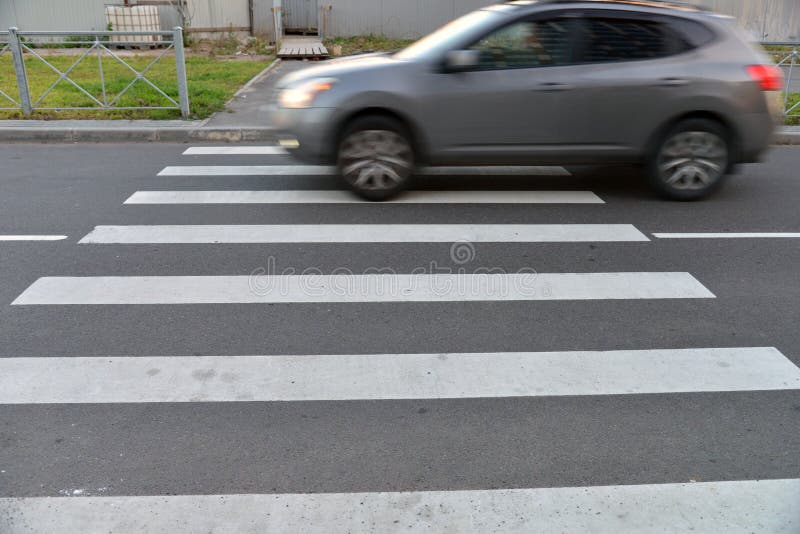 Car is Driving Past a Pedestrian Crossing Stock Photo - Image of ...