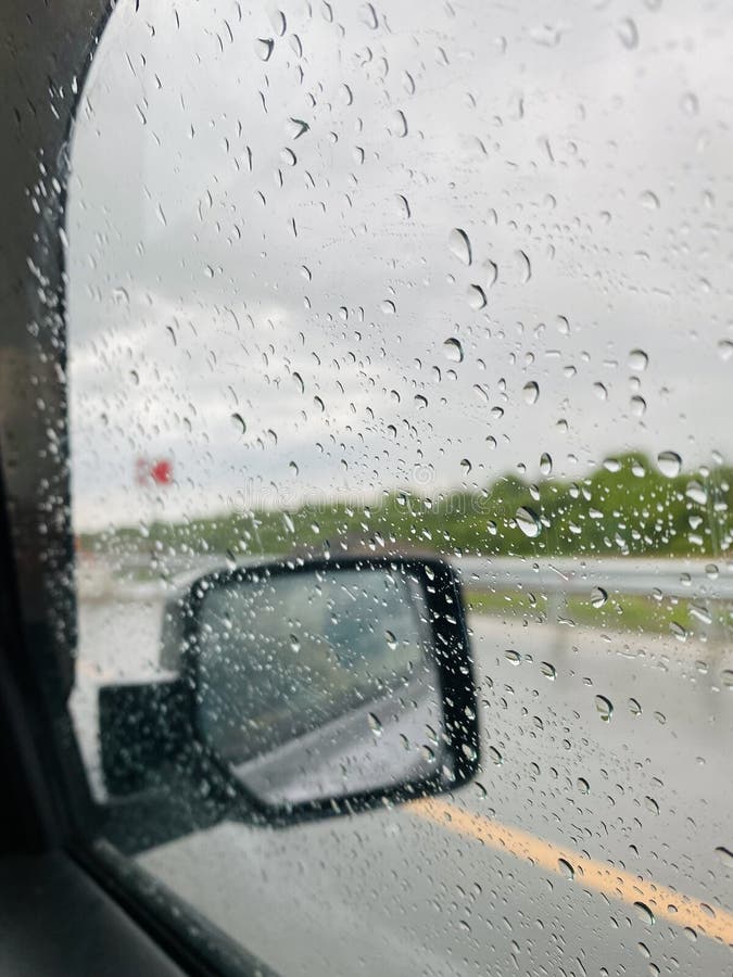 The Car is Driving, it is Raining Stock Photo - Image of glass, leaf ...