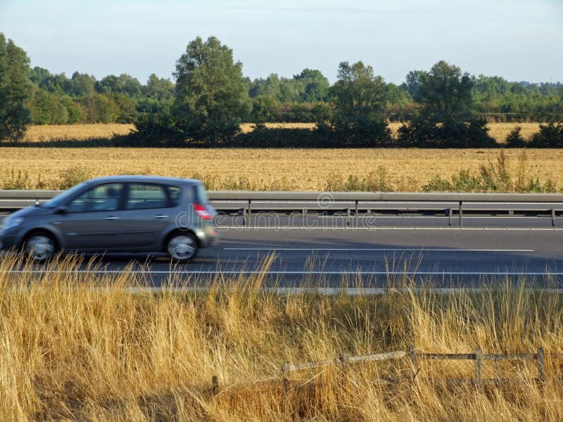 Car driving on road stock photo. Image of travelling, countryside - 1114134