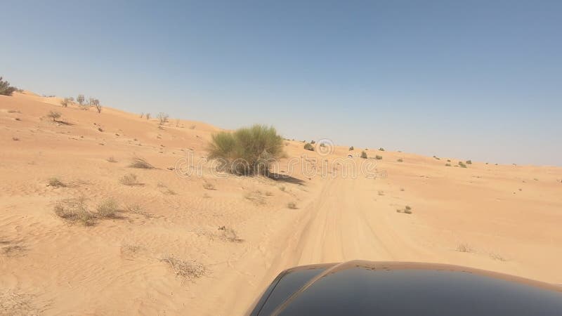 Car is Driving in the Desert. Windshield Camera. Dubai Stock Footage ...