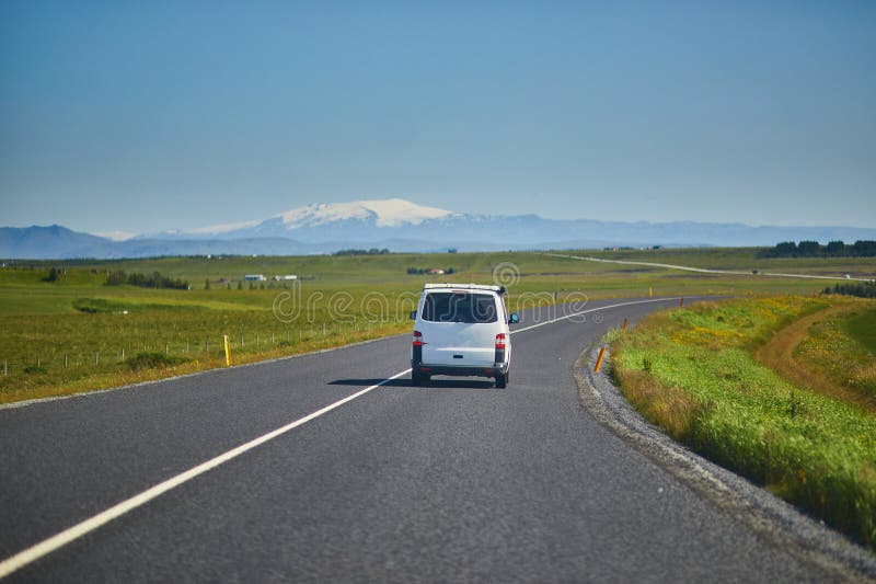 Car Driving on a Road Surrounded by Beautiful Landscape in Iceland ...