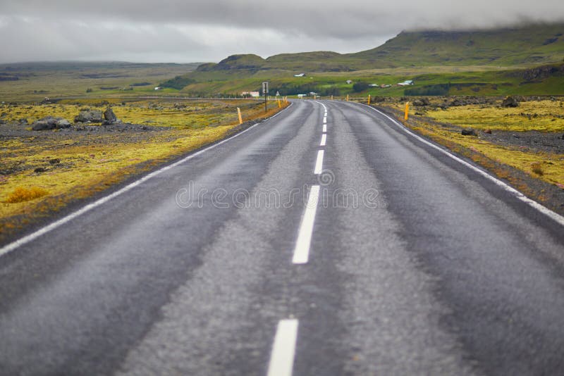 Car Driving on a Road Surrounded by Beautiful Landscape in Iceland ...