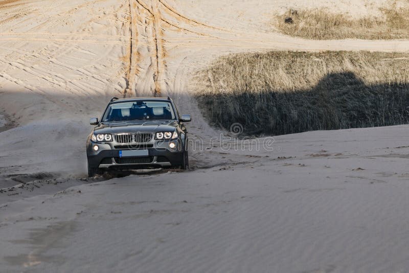 Car Driving through Sand Dune Stock Photo - Image of desert, nature ...