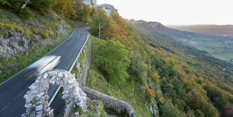 Car Driving Up Mountain with Curved Road Stock Photo - Image of steeple ...