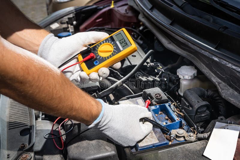 Car Electronic Maintenance Service and Check. Worker Man Stock Photo ...