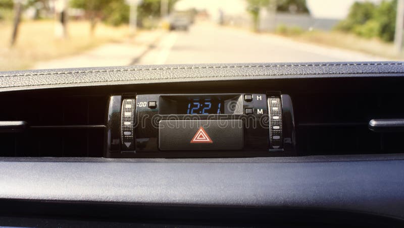 Car Emergency Light Button and Clock Digital Display. Stock Image ...