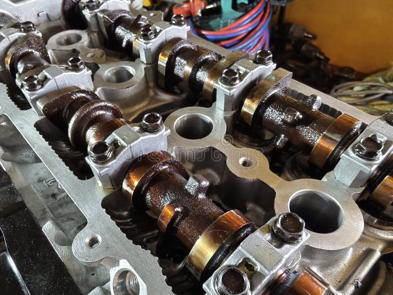 A Car Engine is Being Worked on Inside a Garage Workshop Stock Image ...