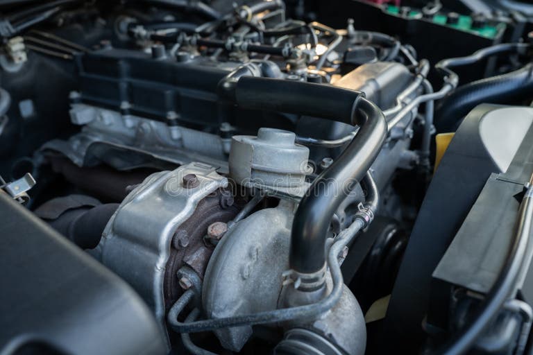 Car Engine with Black Hose Attached the Engine is a Combination of ...