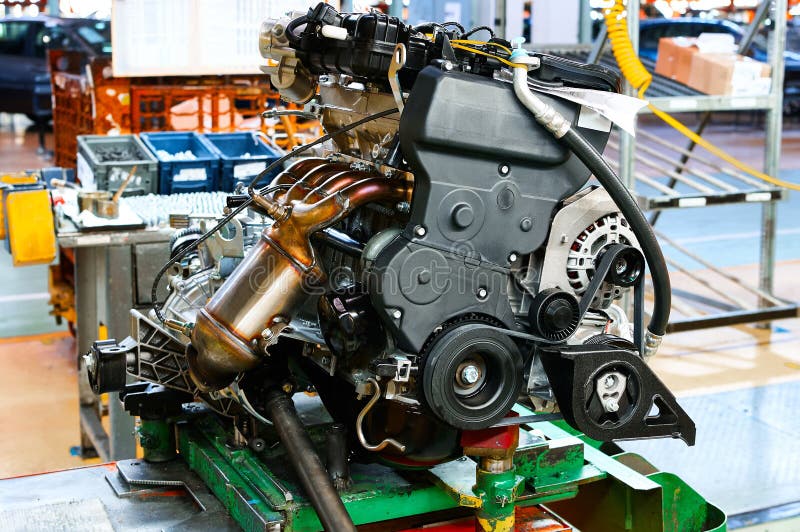 Car Engine on Conveyor in Assembling Plant Workshop Stock Image - Image ...