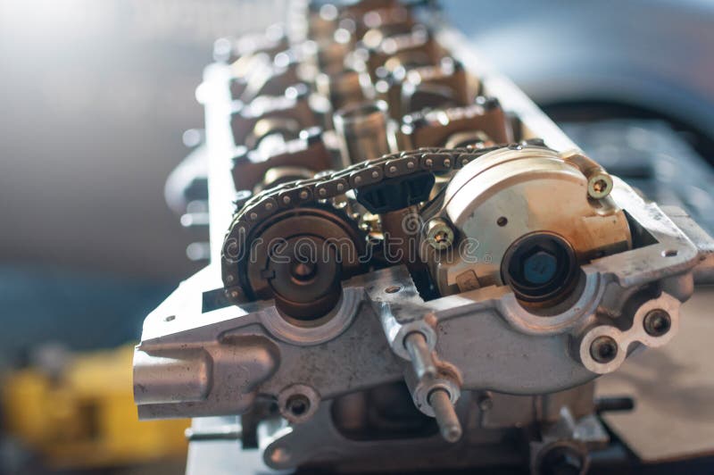 The Cylinder Head of an Old Diesel Engine Disassembled Held in Hand for ...