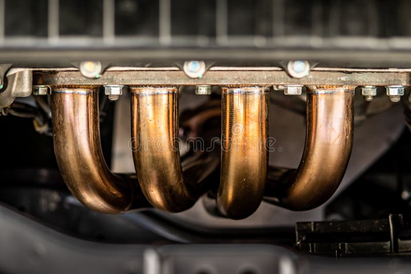 Car engine exhaust header stock image. Image of detail - 154603147