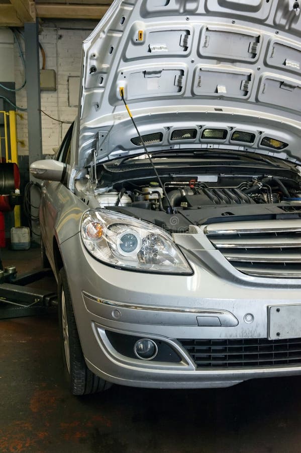 Car engine inspection stock photo. Image of hoist, engineering - 38684564