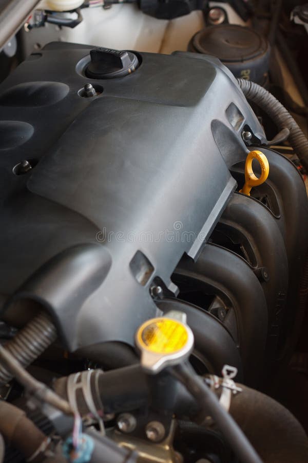 Engine oil cap in car hood stock photo. Image of checkup - 96067882
