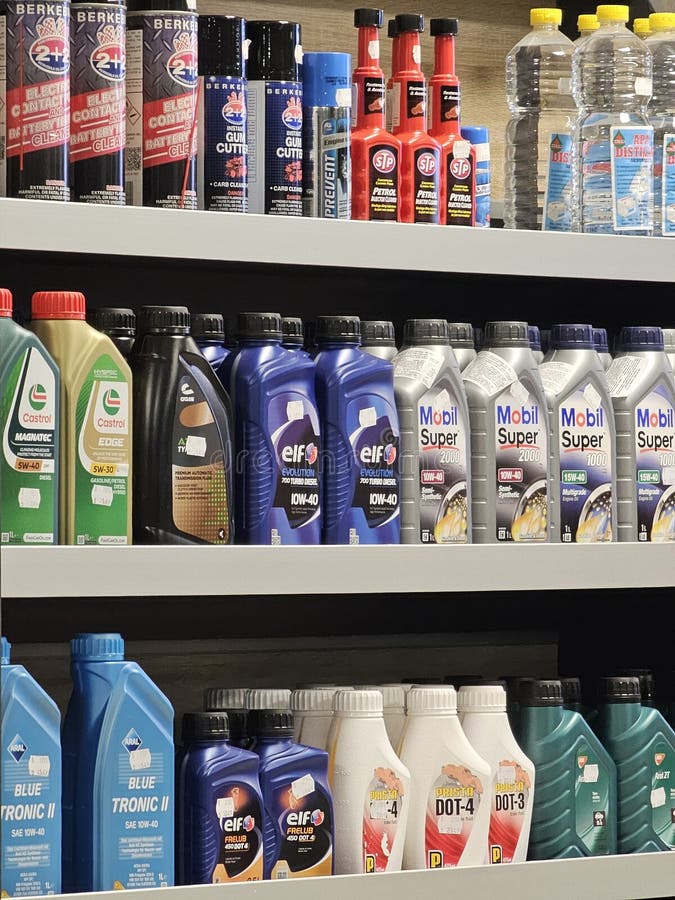 Car Engine Motor Oil Lubricants on Store Shelf Editorial Stock Image ...