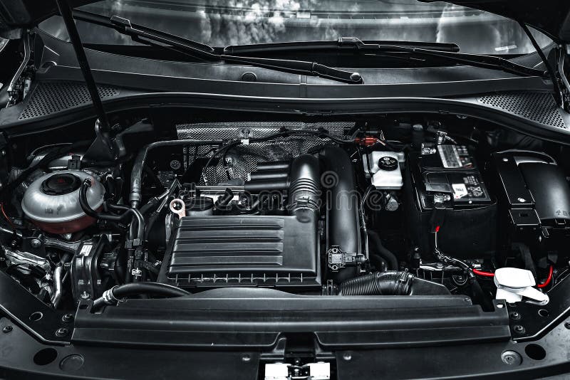 The Car Engine of a New Car. View Under the Hood. Modern Motor. Stock ...