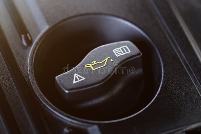Car Engine Oil Cap with Warning Label in Automobile Engine Stock Photo ...
