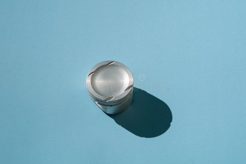 Car Engine Piston on Blue Background, New Auto Part Stock Photo - Image ...