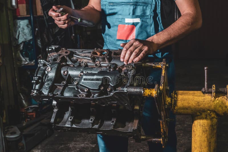 Car Engine Repair in the Garage. Diagnostics and Disassembly of Parts ...