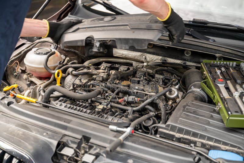 Car Engine Repair with Open Hood and Toolkit during Maintenance Process ...