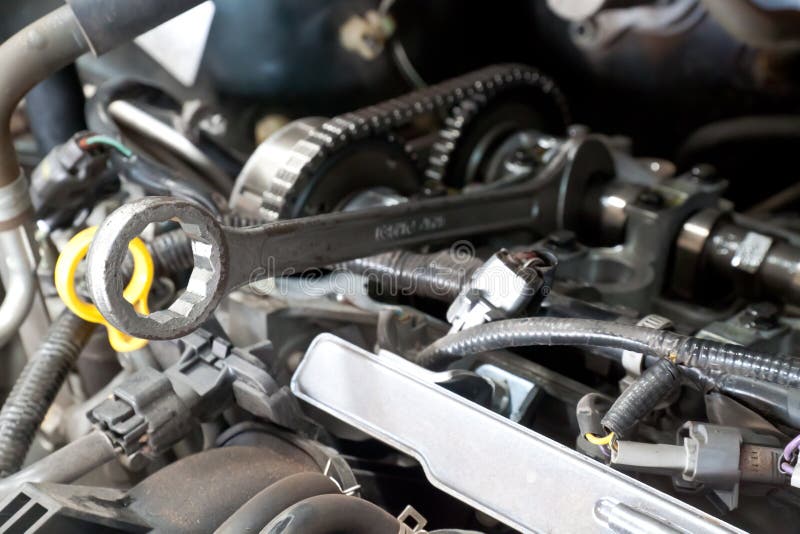 Spanner With Car Engine In Background Stock Photo - Image of sportscar ...