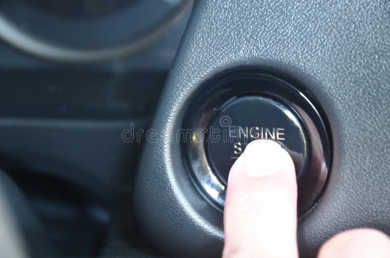 Car Engine Start by Finger Pushing Button in Cockpit Stock Photo ...