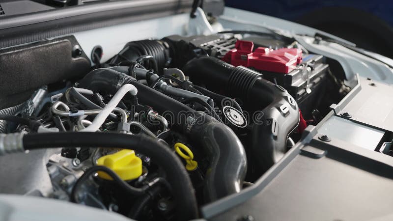 Car Engine Under the Hood of a Modern Car. New Car in the Showroom ...