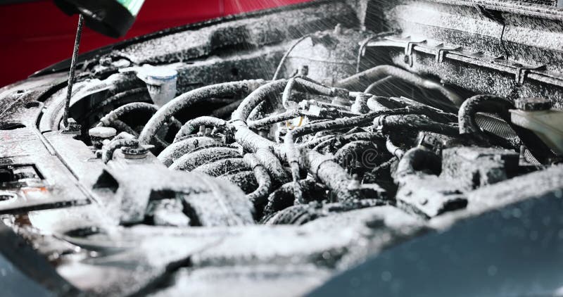 Car Engine Wash. Spraying Active Foam in Engine Bay Stock Footage ...
