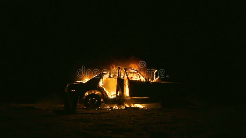 Car Explosion, Side View, Car Burns in a Gray Field Stock Footage ...
