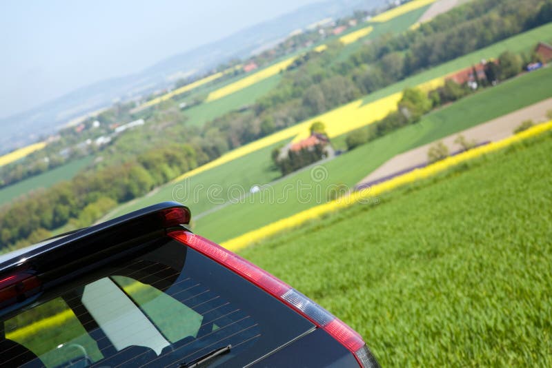 Car and field. stock photo. Image of outdoors, taillight - 7922990