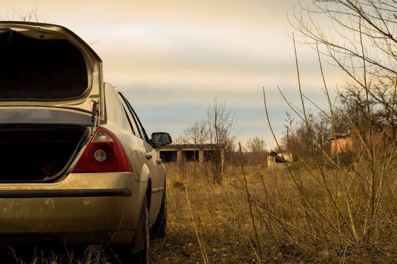 Car in a field stock image. Image of buildings, horizon - 50433203
