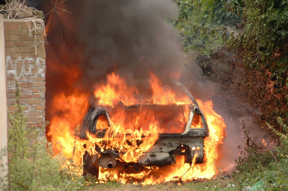 Car on fire in alley way stock photo. Image of terror - 3401022
