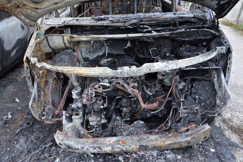 Engine of a burned car stock photo. Image of charred - 117979208
