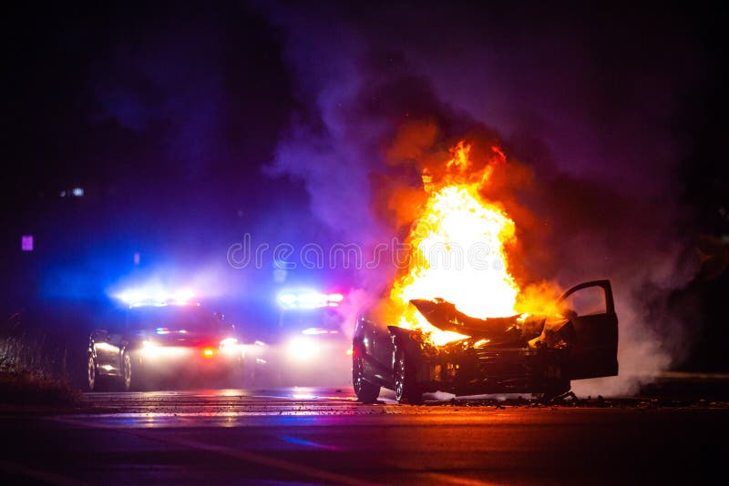 Burning police car. editorial stock photo. Image of city - 26745628