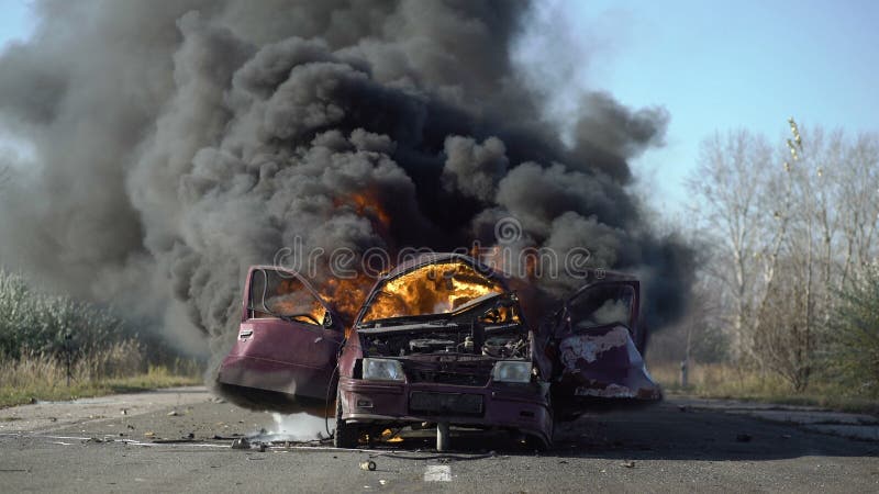 Car on Fire on the Road. Car Explosion. Stock Photo - Image of ...