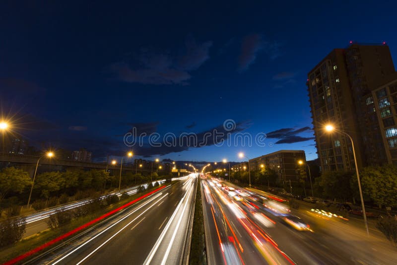 Car flow at night stock image. Image of road, urban, plant - 88306709