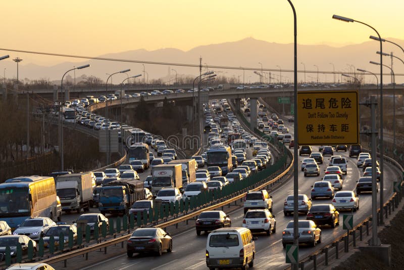 Car flow under sunset stock image. Image of vehicle, sunset - 88306857
