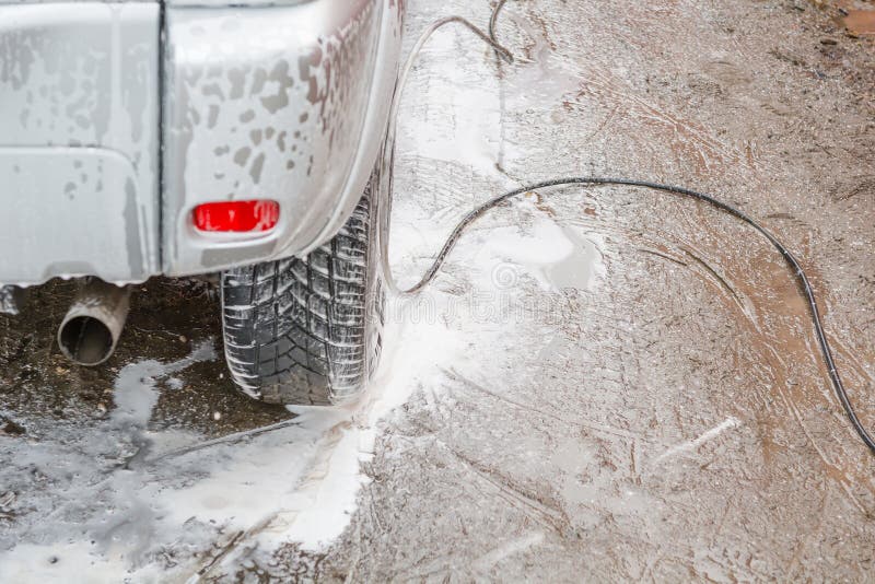 The Car is in the Foam. Foam Car Wash. Foam Sticks with the Car Stock ...