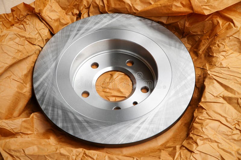Car Front Brake Discs are in a Cardboard Box.Car Brake Repairing in ...