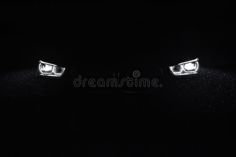 Car Front Headlights Glowing in Dark. Stock Photo - Image of detail ...