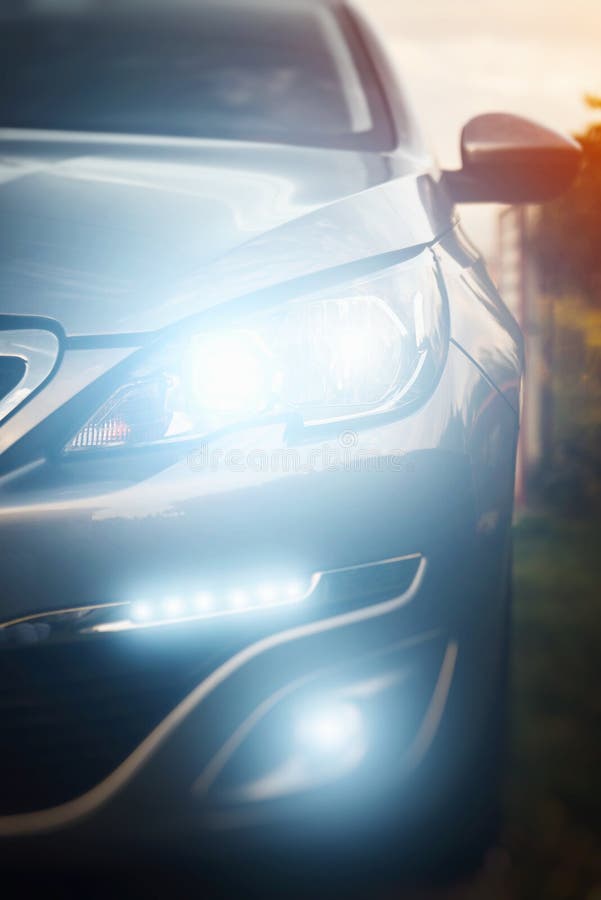 Car Front View with Glowing Headlights Stock Image - Image of bulbs ...