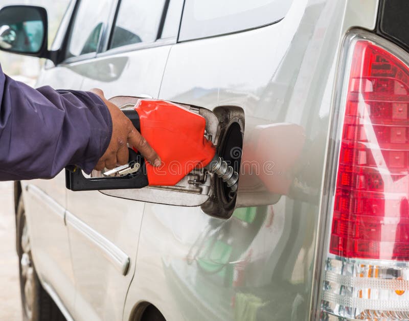 Car fuel refilling stock photo. Image of motor, nozzle - 67541692