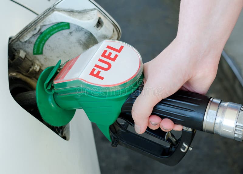 Car fueling stock image. Image of dispenser, female, nozzle - 23741213