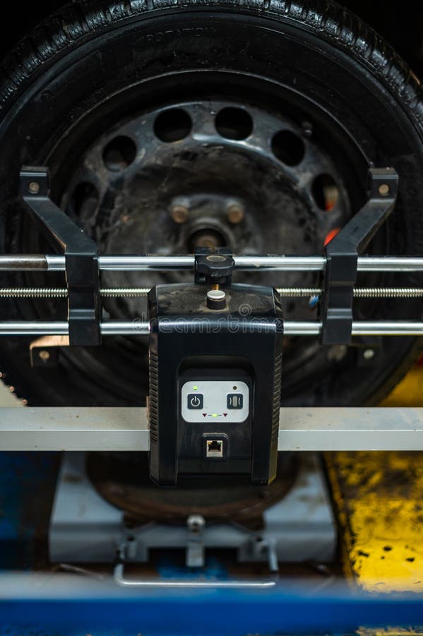 The Car in the Garage, a Device for Adjusting the Camber. Stock Photo ...