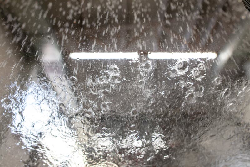 Car Glass at a Car Wash in Drops of Water. Background Stock Photo ...